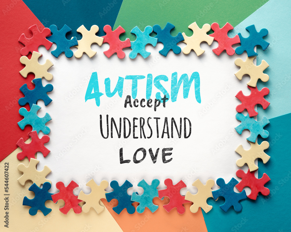 Text World Autism Awareness Month, April, frame with puzzle pieces ...