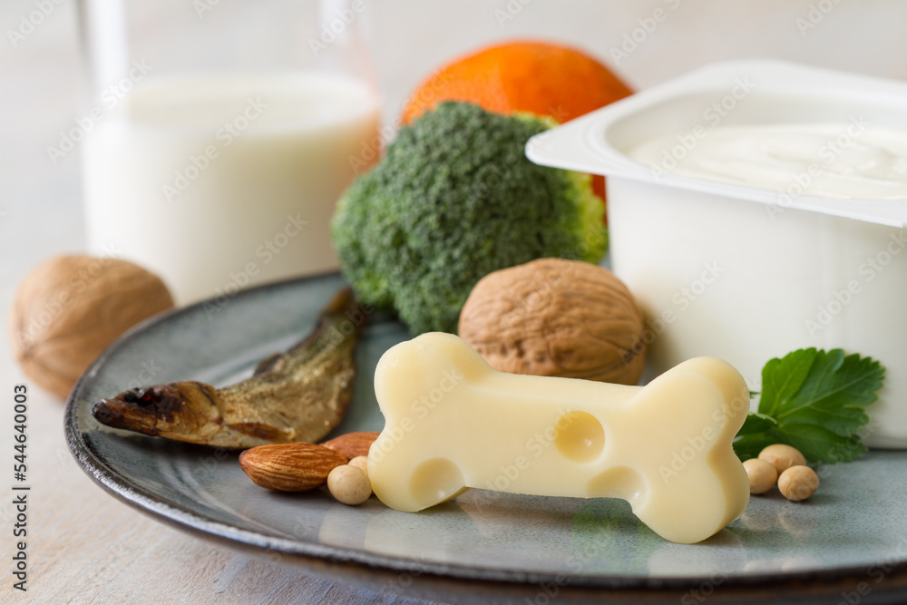 Bone shaped cheese and bone strengthening foods products, concept ...