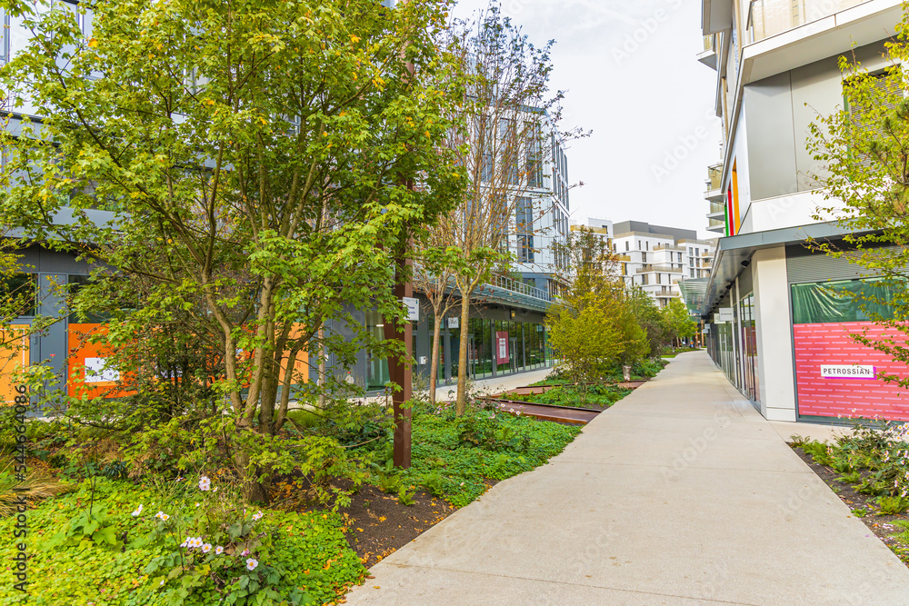 Trees and buildings inner court of Issy Coeur de Ville eco-neighborhood ...