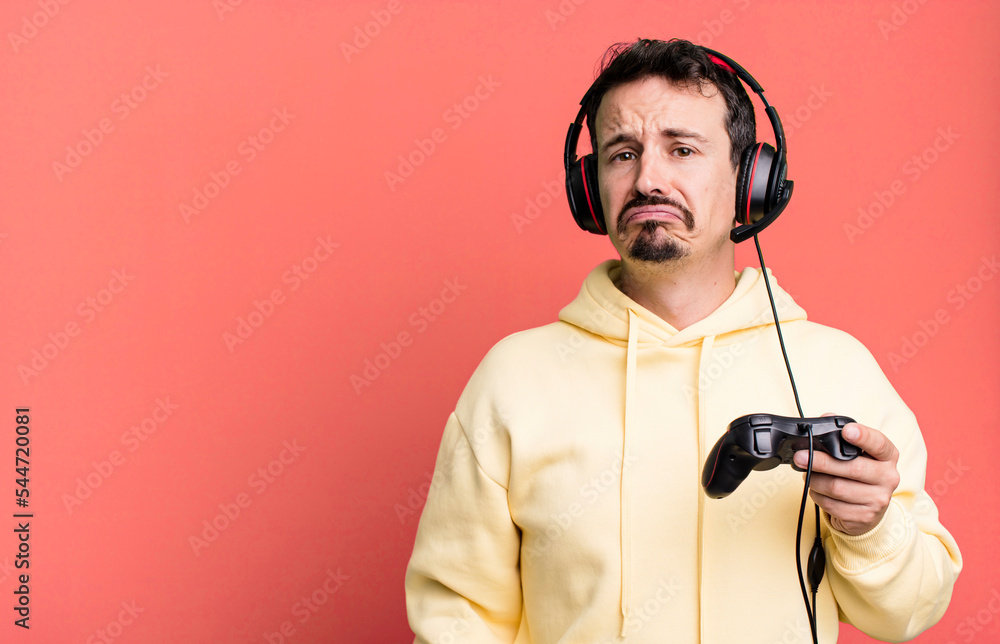 adult man feeling sad and whiney with an unhappy look and crying with ...