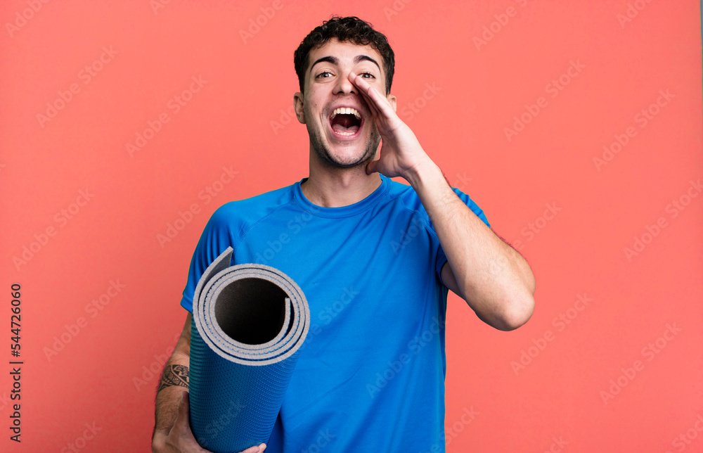 adult man feeling happy,giving a big shout out with hands next to mouth ...