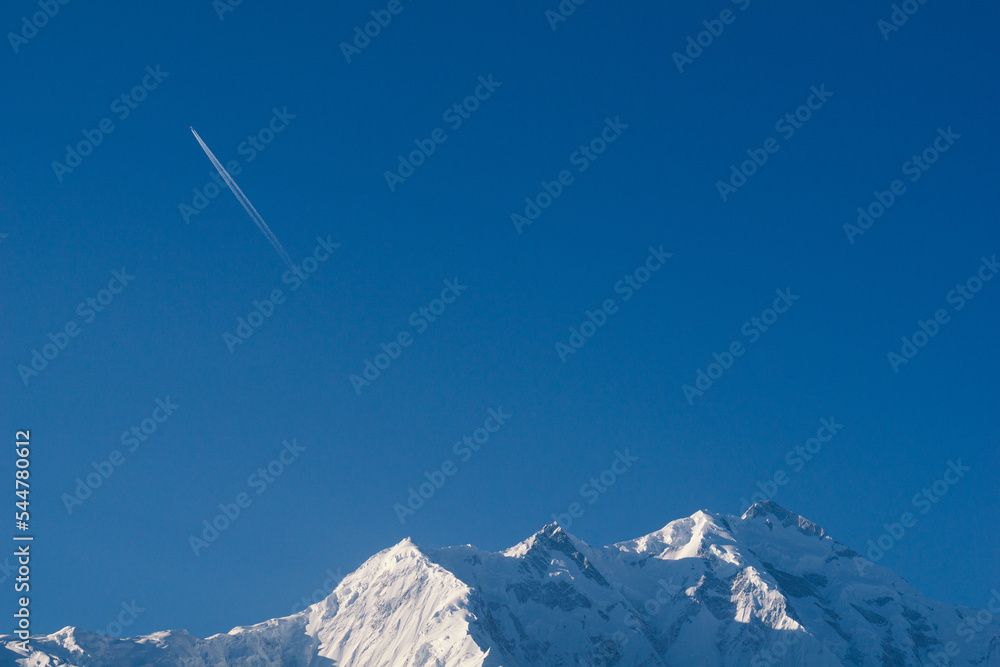 Stockfoto Moning view of Mount Rakaposhi with airplane over it in the ...