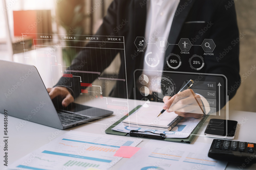 Businessman hand Project manager working and update tasks and Gantt ...