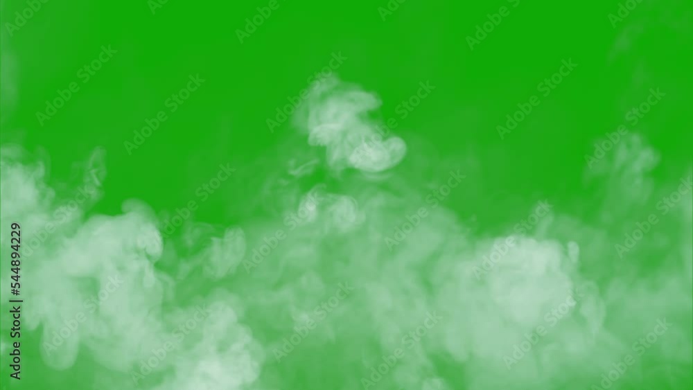 White smoke on a blue green screen background is used as a transition ...