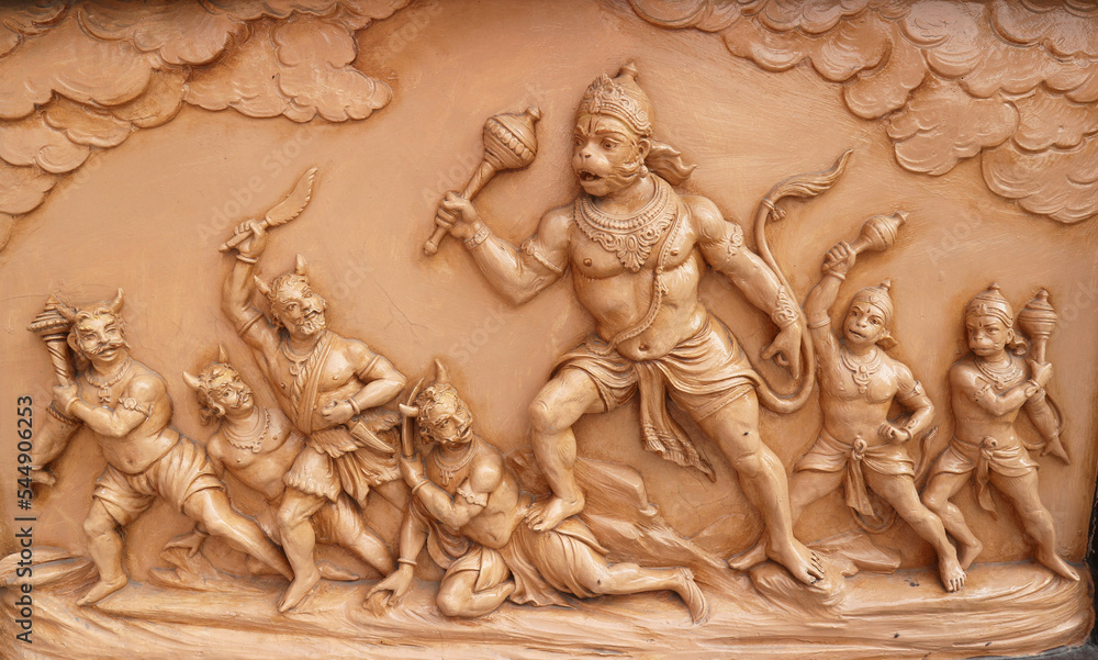 Hanuman fights demons. A story from the Ramayana on a temple wall in ...