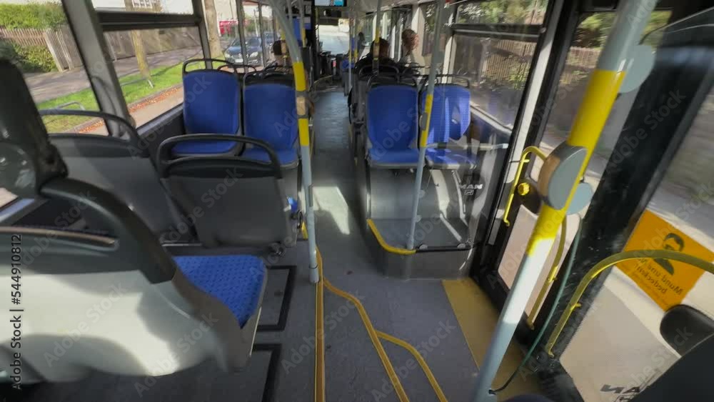 Germany. Munich. City bus on route, filmed inside the interior in sunny ...