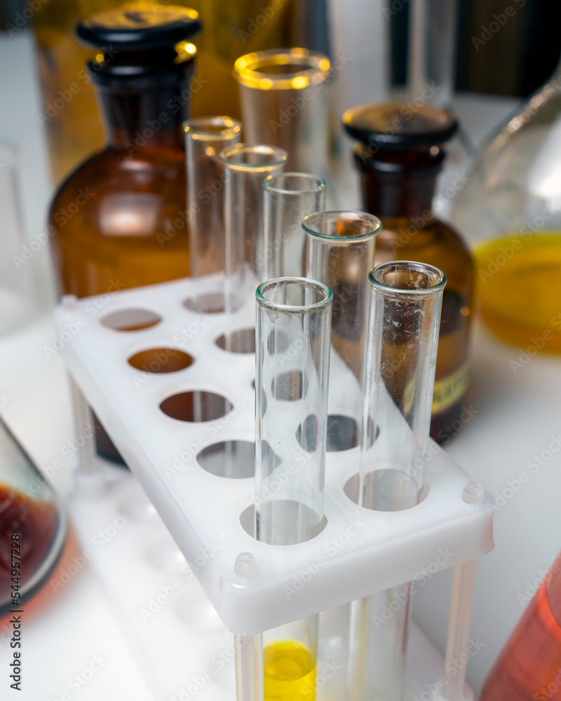 Food additives in test tubes and flasks on the laboratory table. food ...