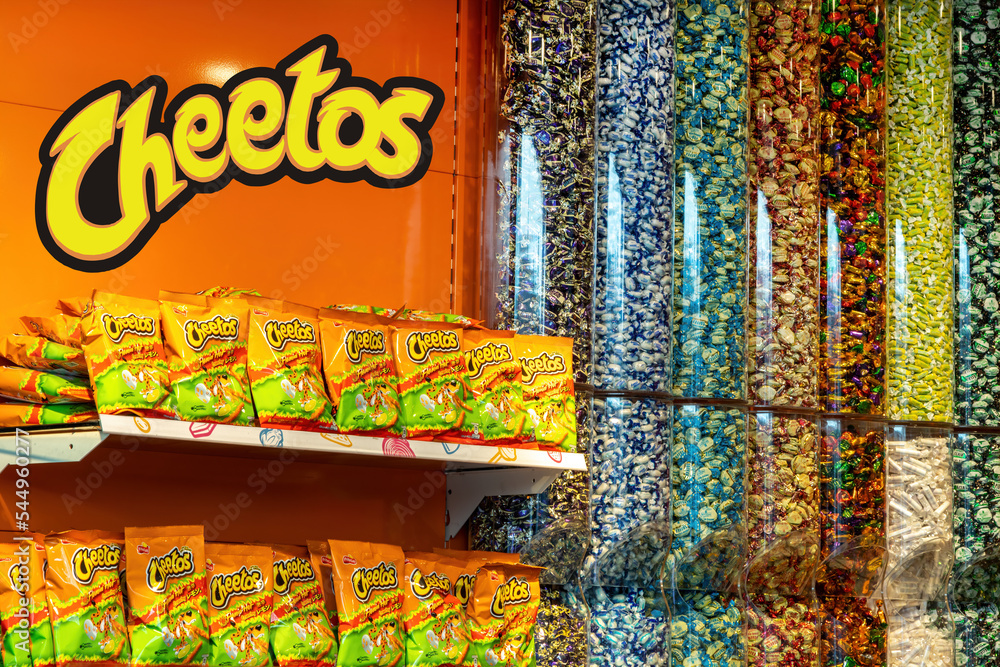 Bags of flaming hot crispy Cheetos in a candy store in Holland Stock ...
