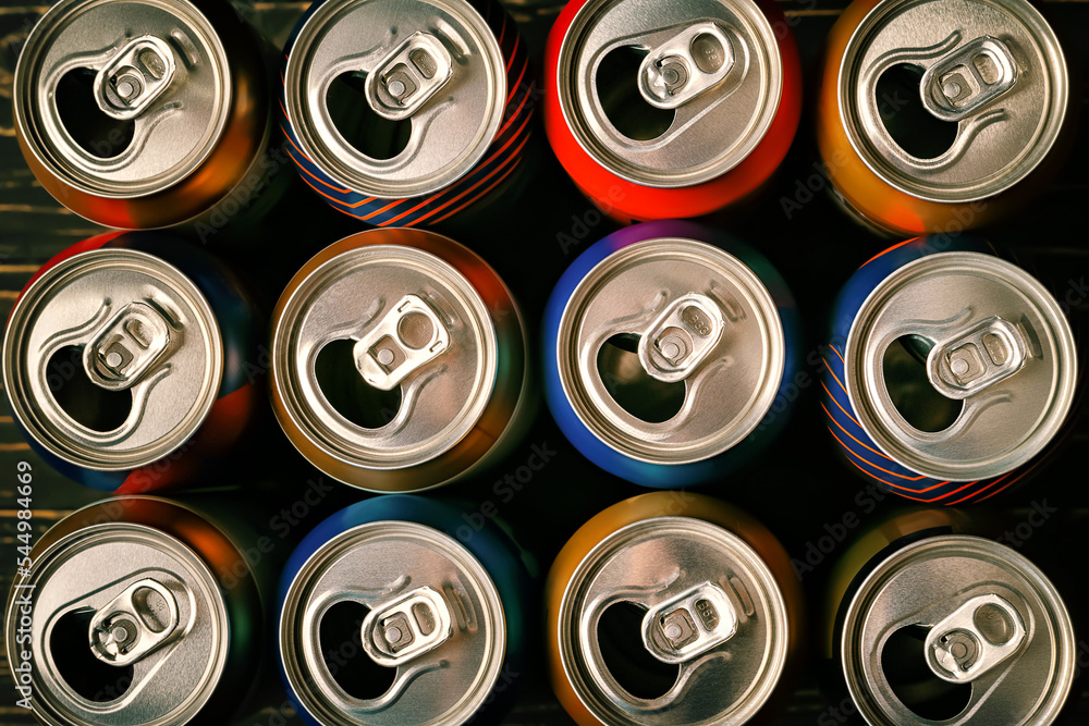 Beer cans. Aluminum cans. Top view of many colorful open empty cans ...