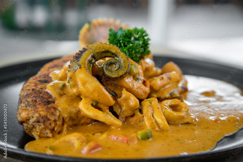 Typical peruvian food and drinks, tacu tacu with octopus Stock Photo ...