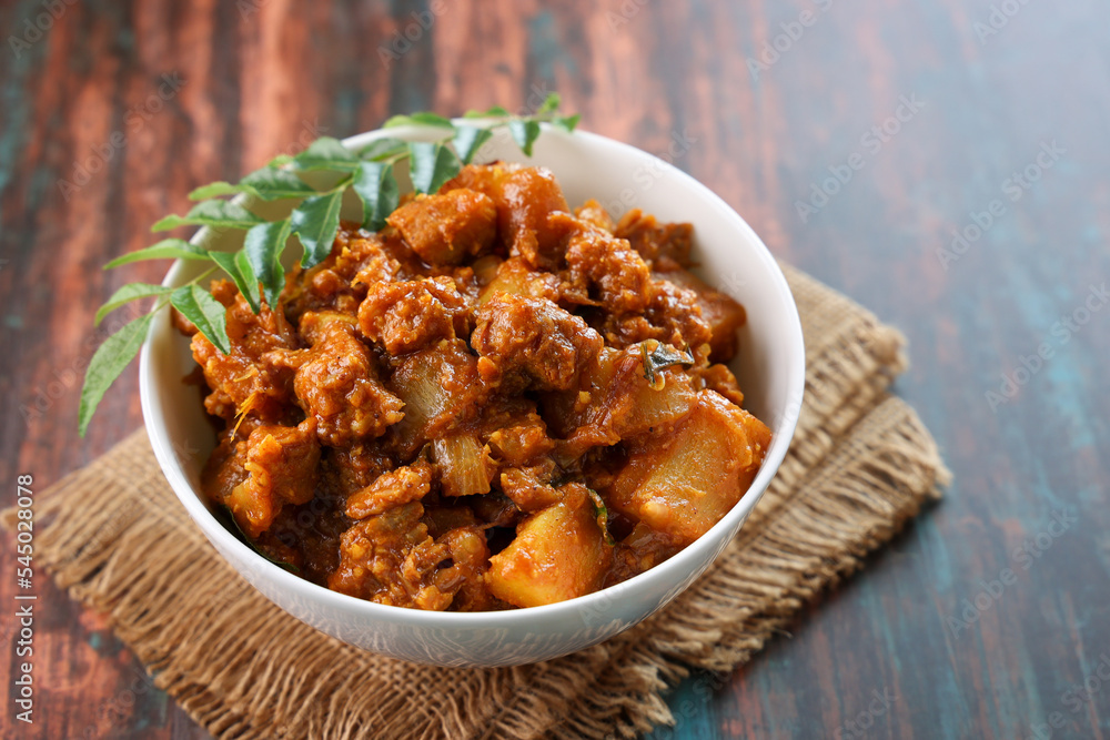 Cooked tapioca and spicy meat curry , Cassava root , Mandioca or Aipim ...