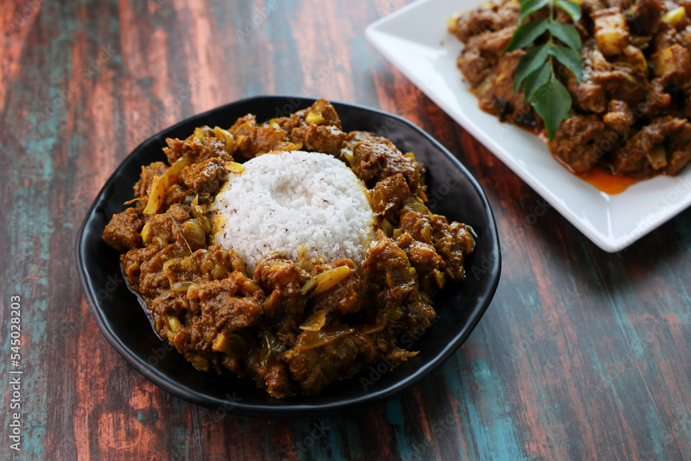 Rice Puttu or pittu steamed rice cake and meet beef curry popular in ...