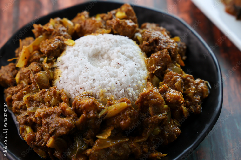 Rice Puttu or pittu steamed rice cake and meet beef curry popular in ...