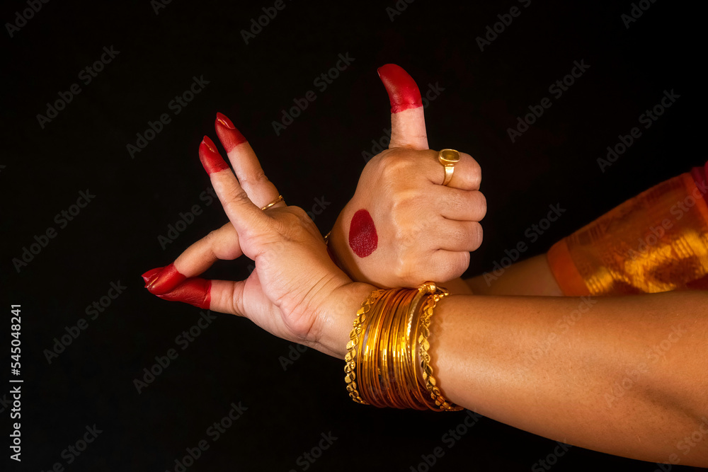 Indian classical dance hand mudras or gestures demonstrated by female ...