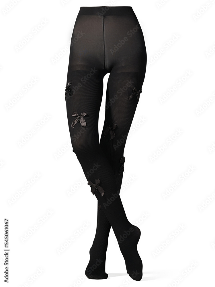 Close-up shot of black tights decorated with black satin bows and pearl ...