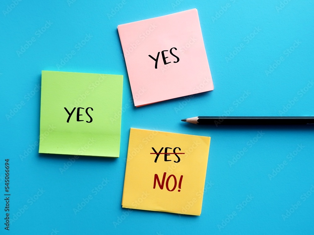 Note paper with handwriting YES YES YES and last one changed to NO ...