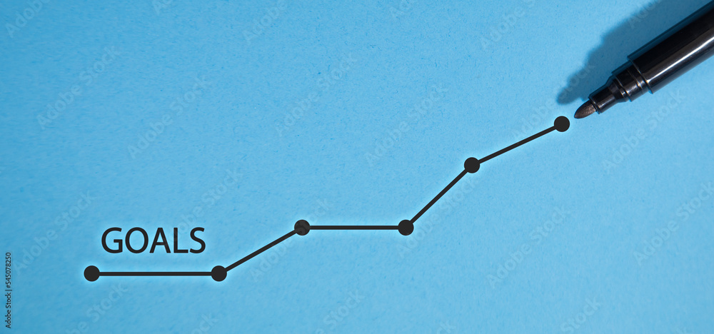Goals growth graph with a marker. Stock Photo | Adobe Stock