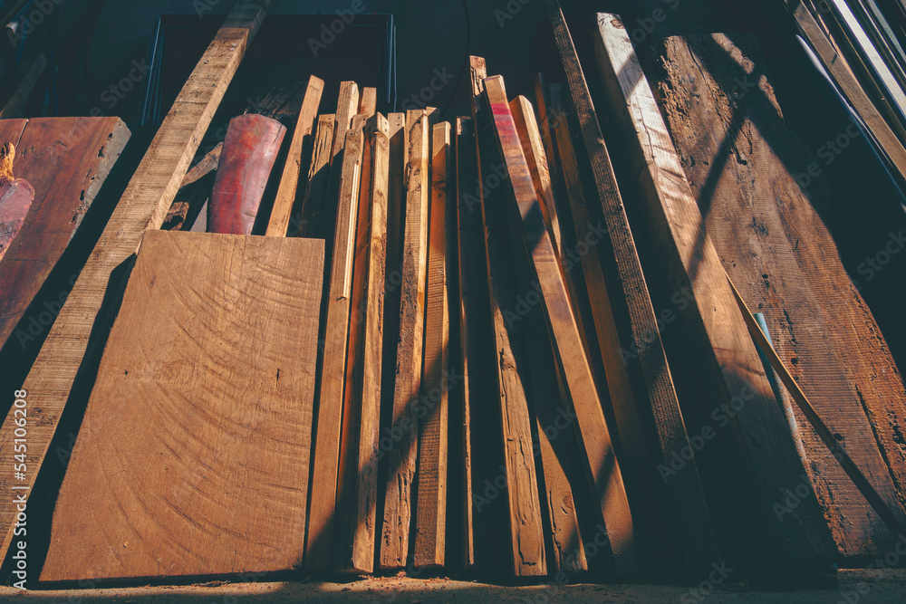 Light and shadow on surface of many old various remaining wooden ...