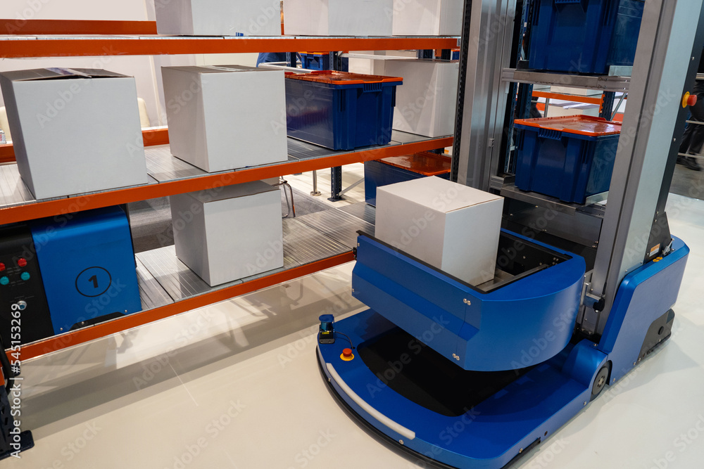 Warehouse automation. Sorting machine drives inside warehouse ...
