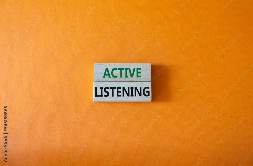Active listening symbol. Wooden blocks with words Active listening ...