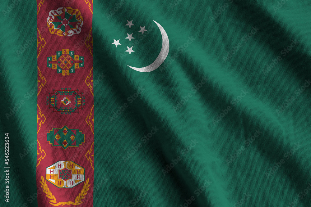 Turkmenistan flag with big folds waving close up under the studio light ...