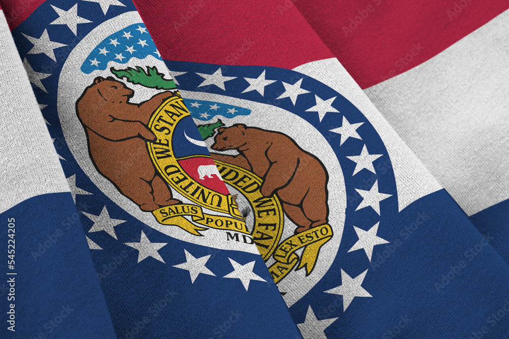 Missouri US state flag with big folds waving close up under the studio ...