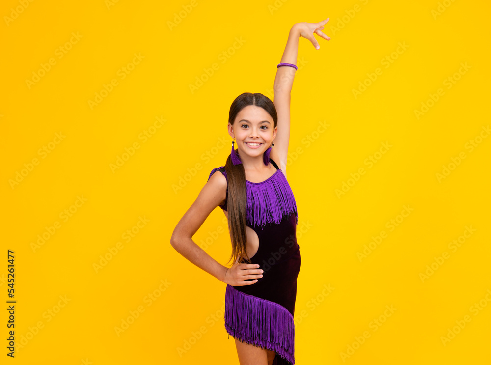 Ballroom teenager dancer isolated on studio yellow background. Latin ...