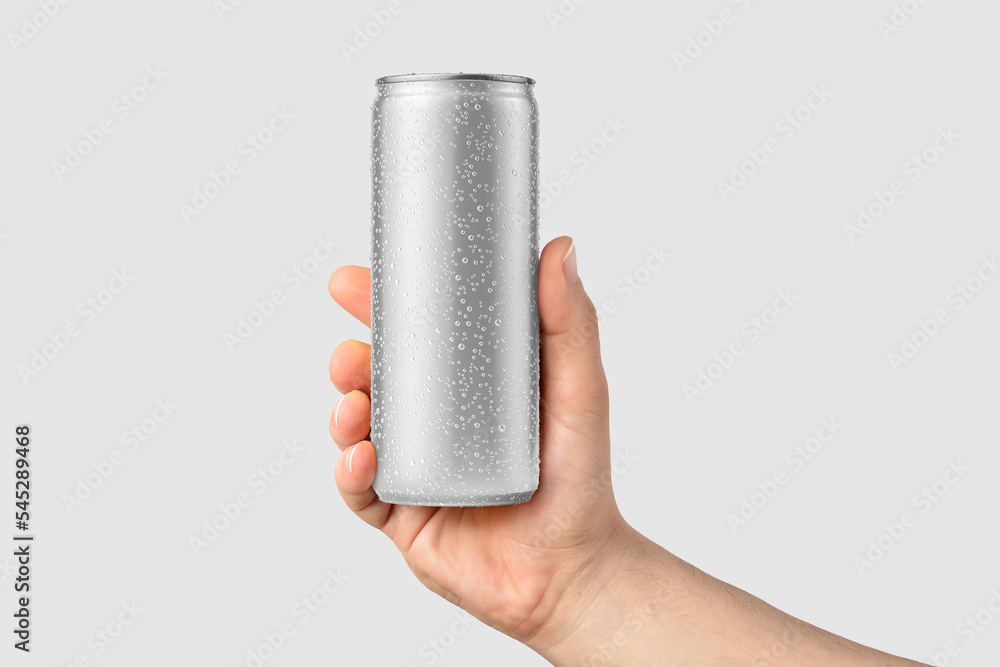Aluminium drink can 250ml with water drops in a hand mockup template ...