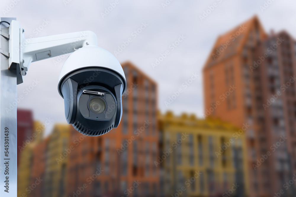 Modern public CCTV camera with blur building background. Recording ...
