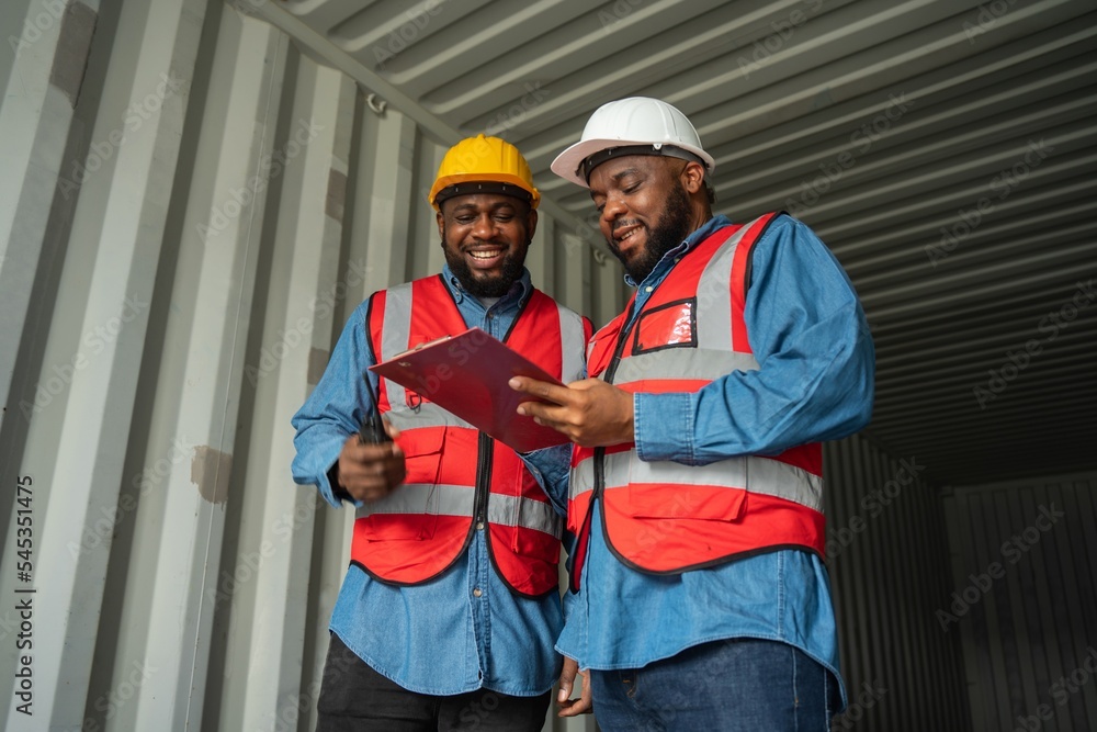Stockfoto Two black african male professional engineers doing routine ...