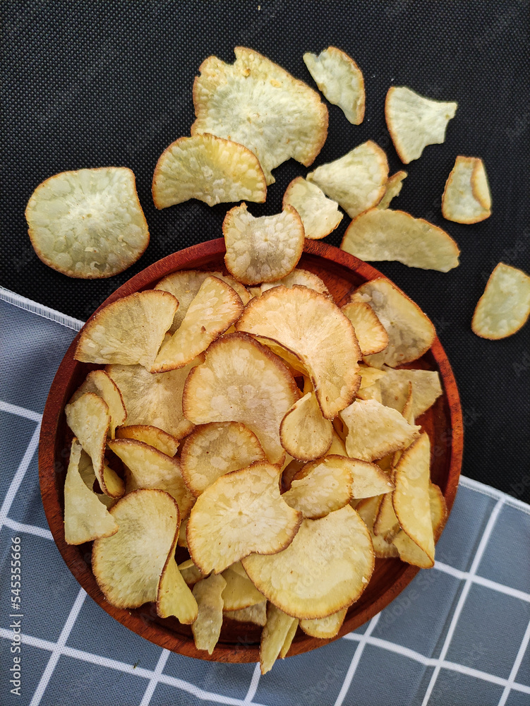 Cassava chips, traditional snack, fried of thin sliced cassava. Flat ...