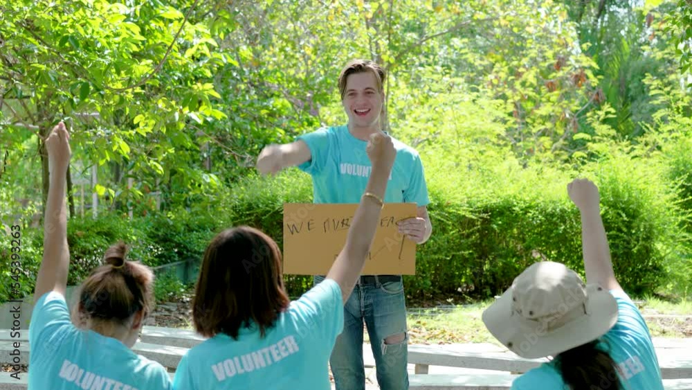 Volunteer leader giving instructions on fight for climate change global ...