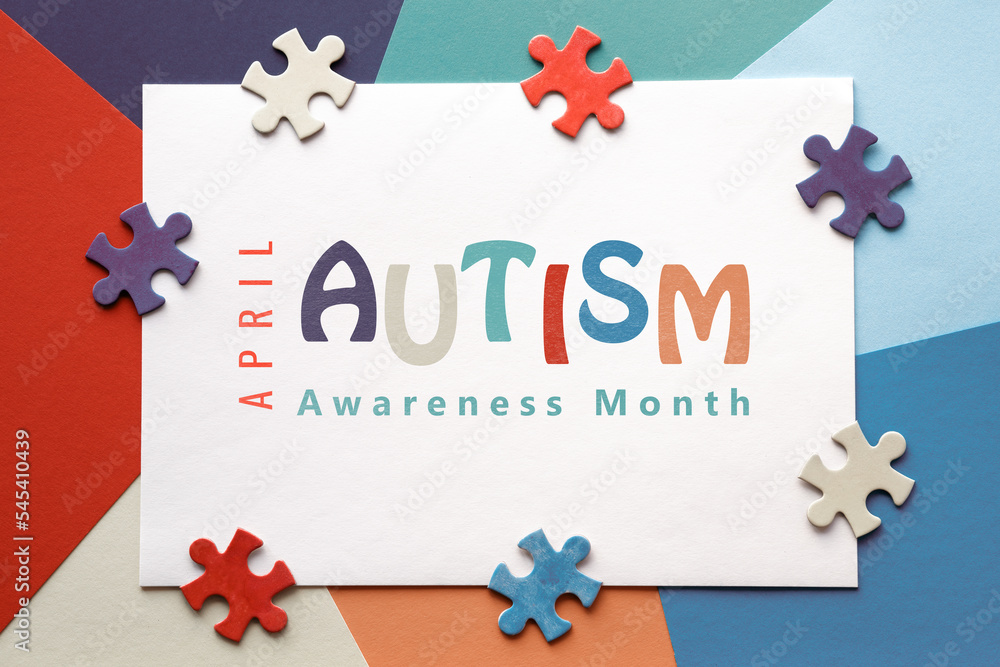 Text April, World Autism Awareness Month, frame with puzzle pieces ...