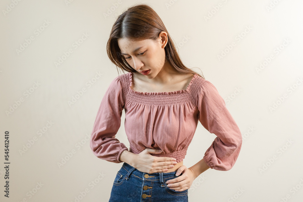 Flatulence young asian woman, girl hand in stomach ache, suffer from food poisoning, abdominal ...