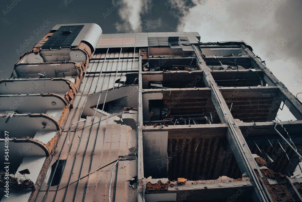 Foto de Old building being demolished to make room for new architecture ...