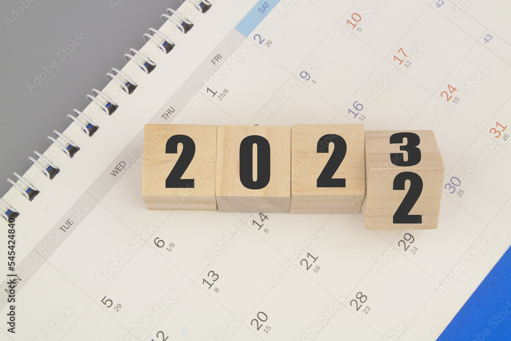 Flipping numbers 2022 and 2023 on calendar page. Events in 2023 and ...