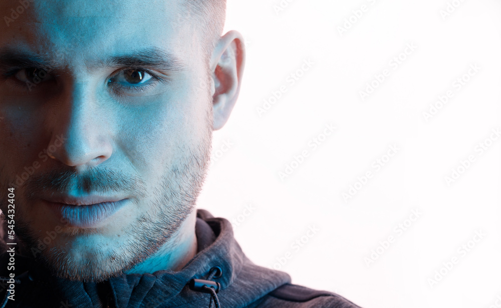 Male with futuristic holographic interface to display data. Portrait of ...