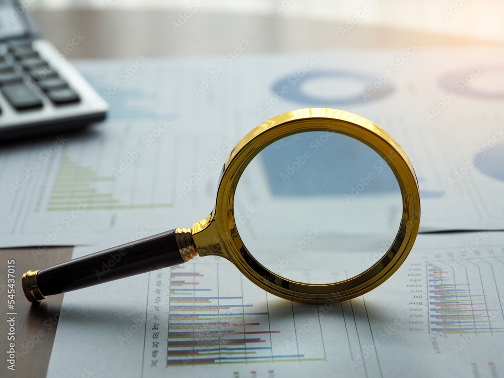 magnifying glass set on table growth chart with graph magnifier Stock ...