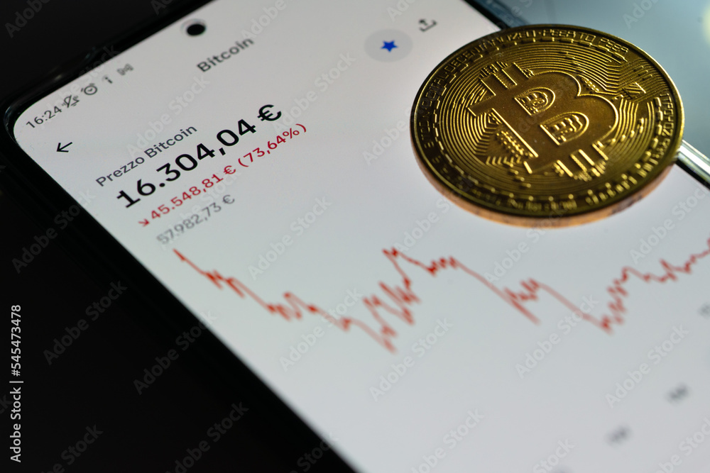 bitcoin price phone app with candlestick chart and golden coins Stock ...