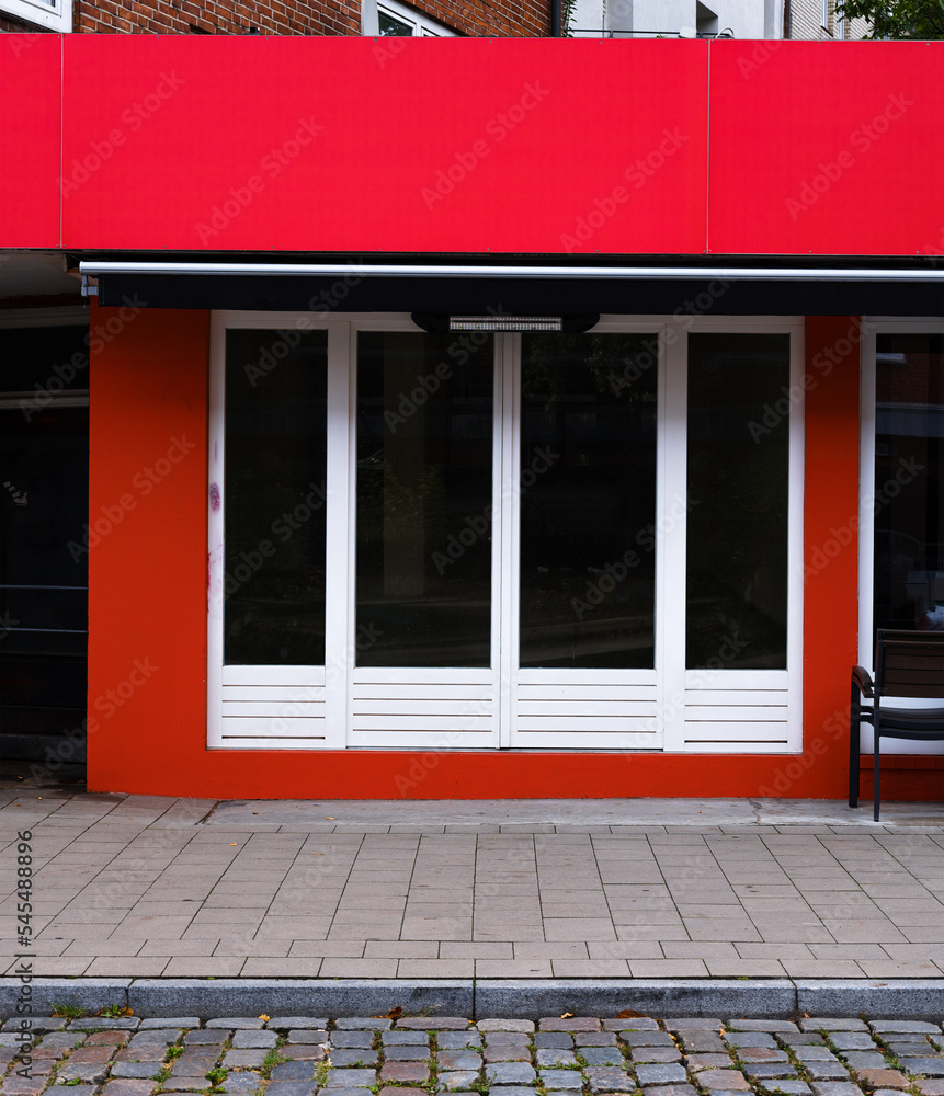 closed korean restaurant, shop front of locked and empty store, impact ...