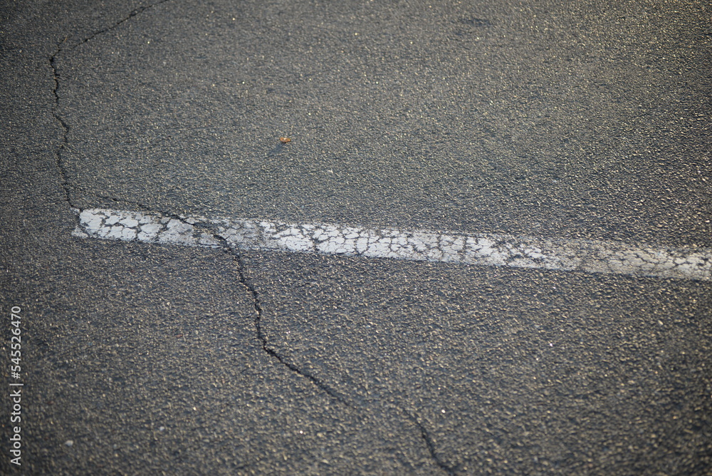 white lines abstract on asphalt, road markings white stripes on the ...