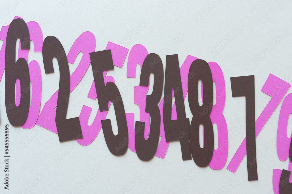 paper background with brown and pink numbers Stock Photo | Adobe Stock