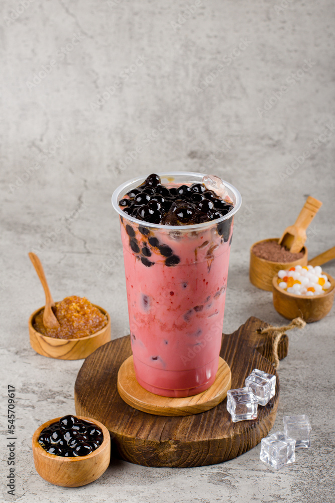 Boba or tapioca pearls is taiwan bubble milk tea in plastic cup with ...
