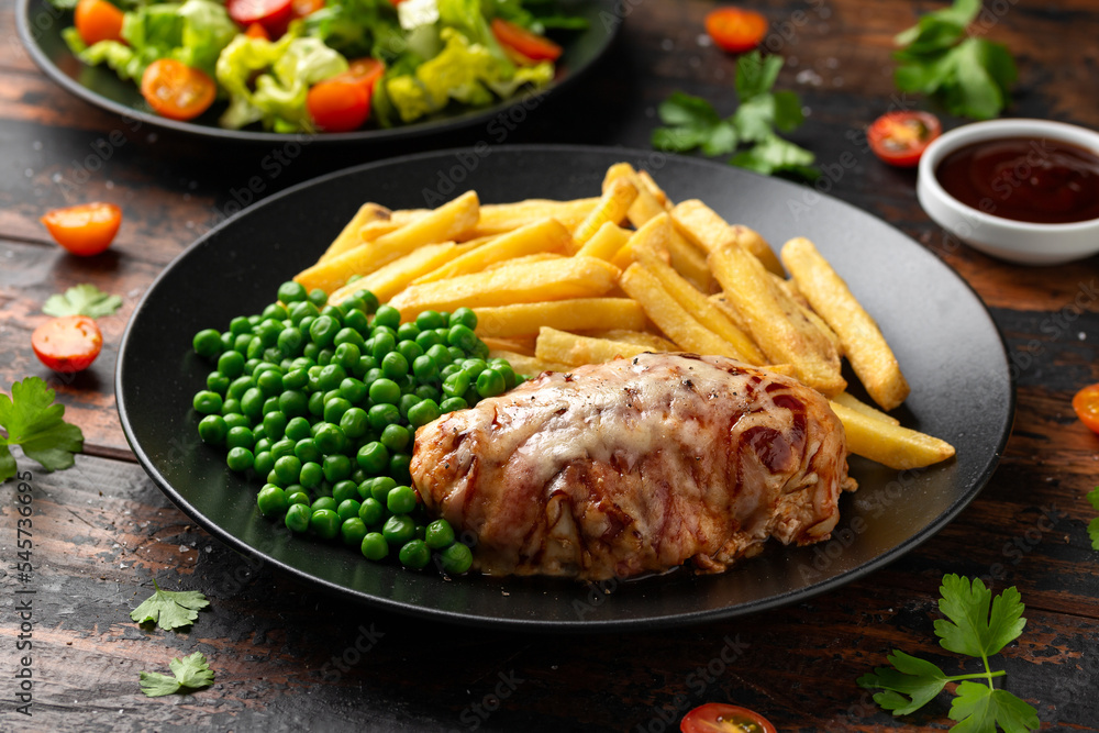 English Pub Classic Hunters Chicken with green peas and potato fries ...