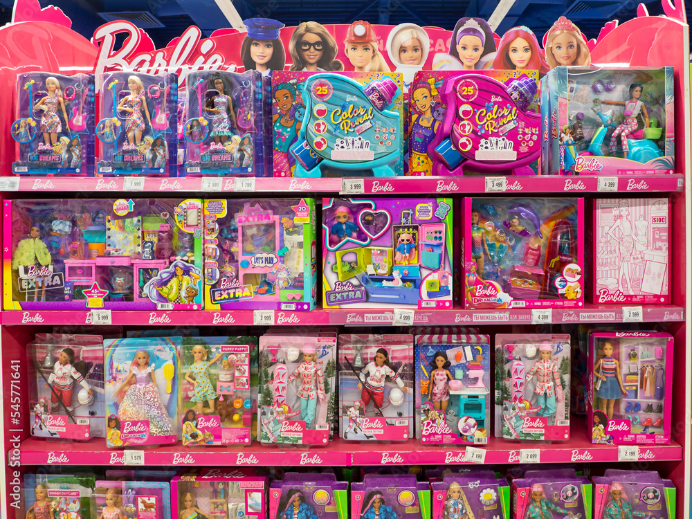The word Barbie . Barbie dolls on the shelf in the store.Logo. Russia ...