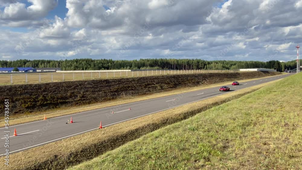 Drag racing, racing cars compete in 402 meters. Arrivals of cars on a ...