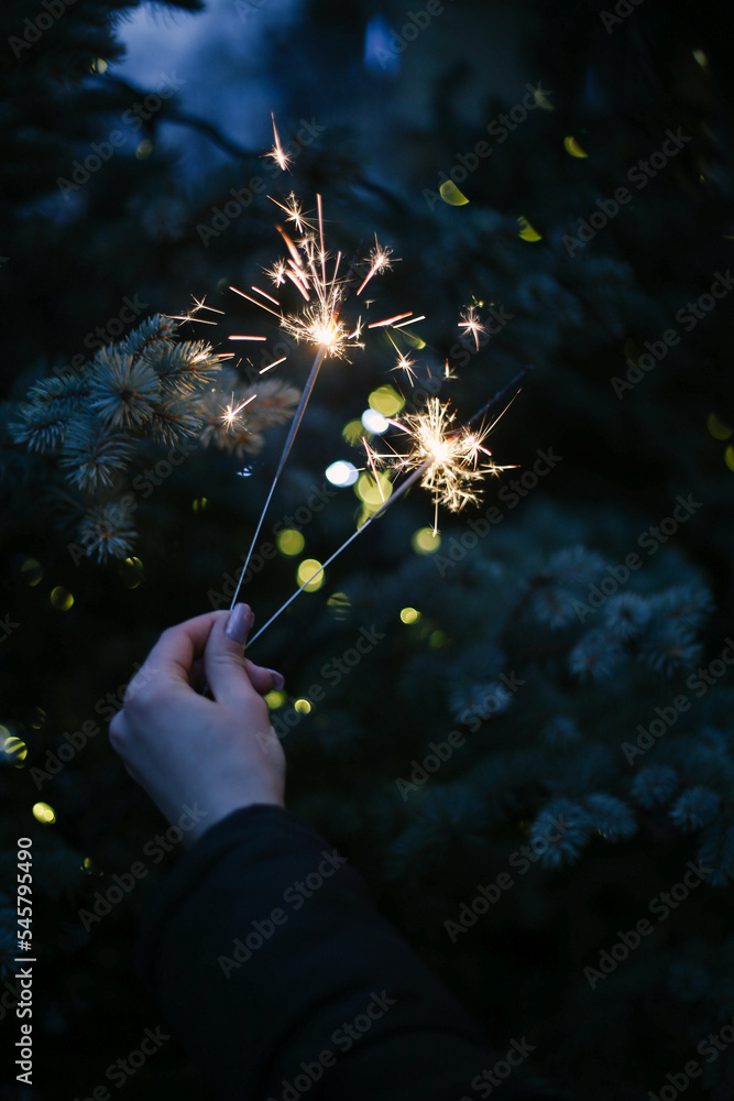 hand holding fireworks Stock Photo | Adobe Stock