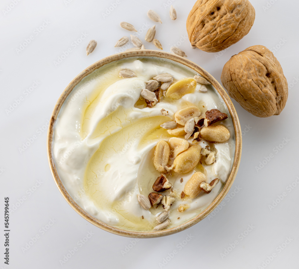 greek yogurt with honey syrup and nuts Stock Photo | Adobe Stock