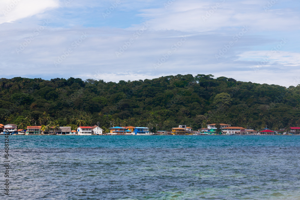 Beautiful beach of Isla Grande in Colon, Panama, colorful houses and ...