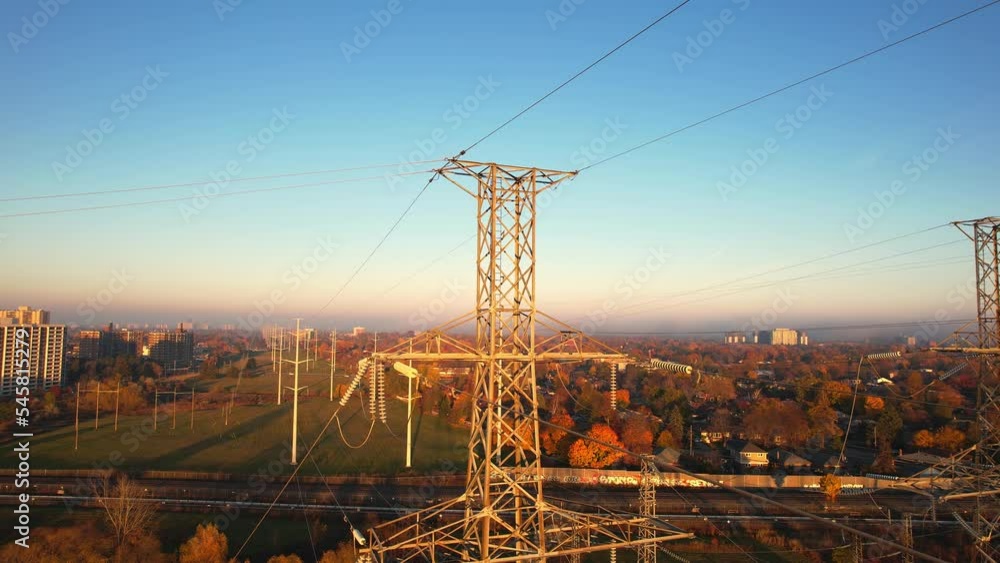 High voltage electric towers at golden hour sunset. Transmission power ...